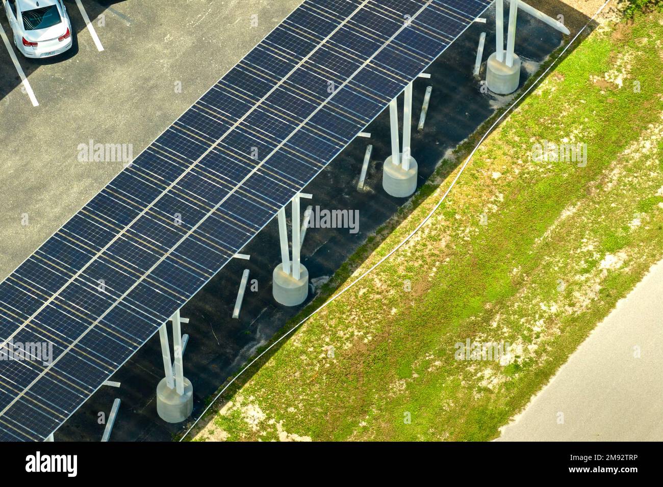 Solar panels installed over parking lot for parked cars for effective ...
