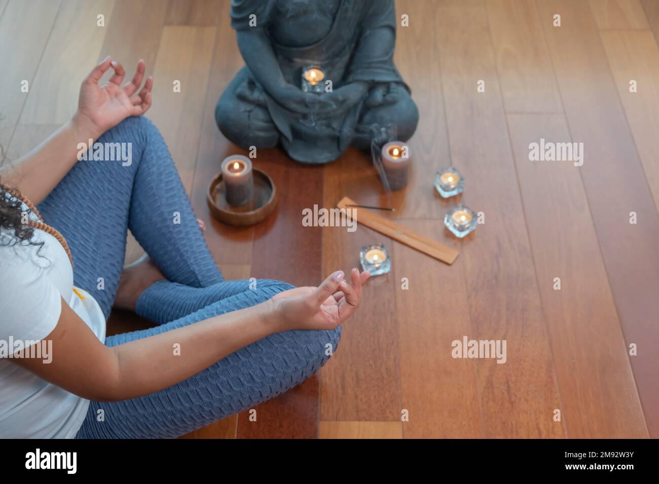 Burning candles near holy statue hi-res stock photography and images ...