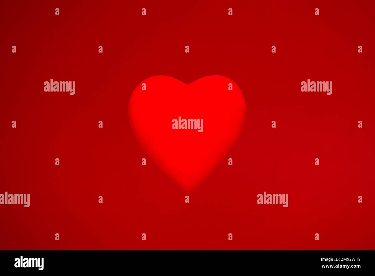 Background material for Valentine's Day with a red heart object on a ...