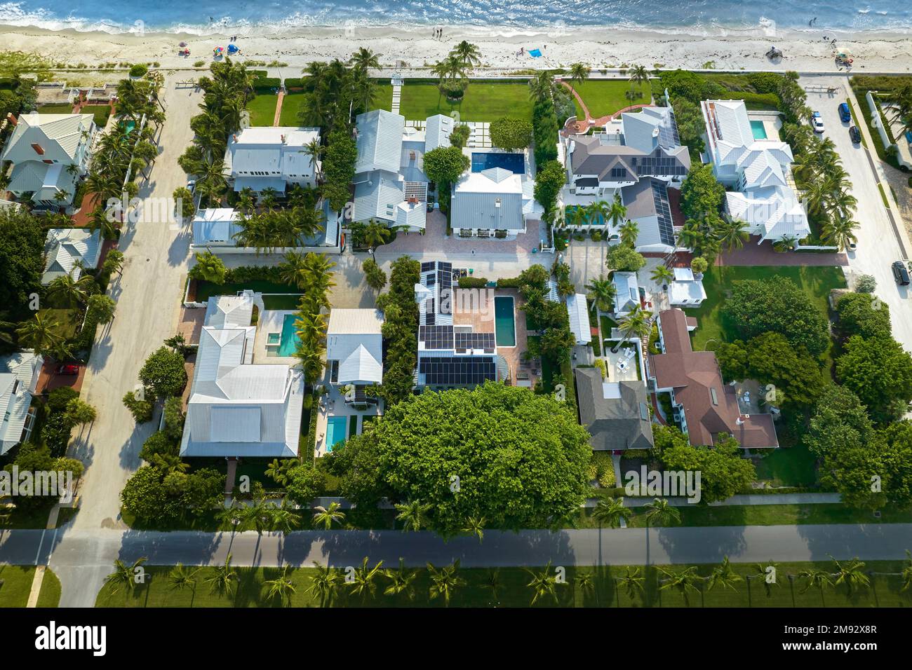 View from above of large residential houses in closed living golf club ...