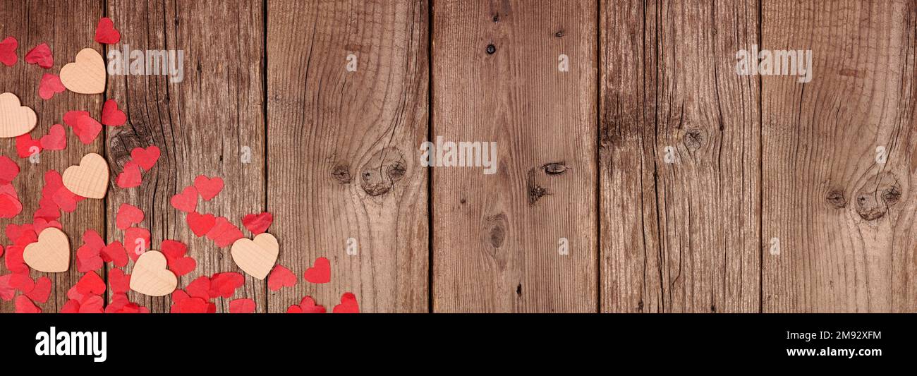 Valentines Day banner with corner border of wooden hearts and confetti ...