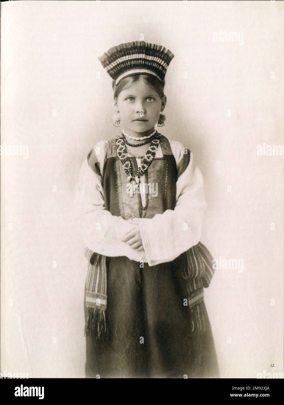 Young Russian woman in traditional cultural dress from South Russia ...