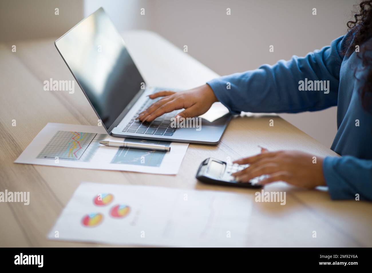Woman hand using calculator table hi-res stock photography and images ...