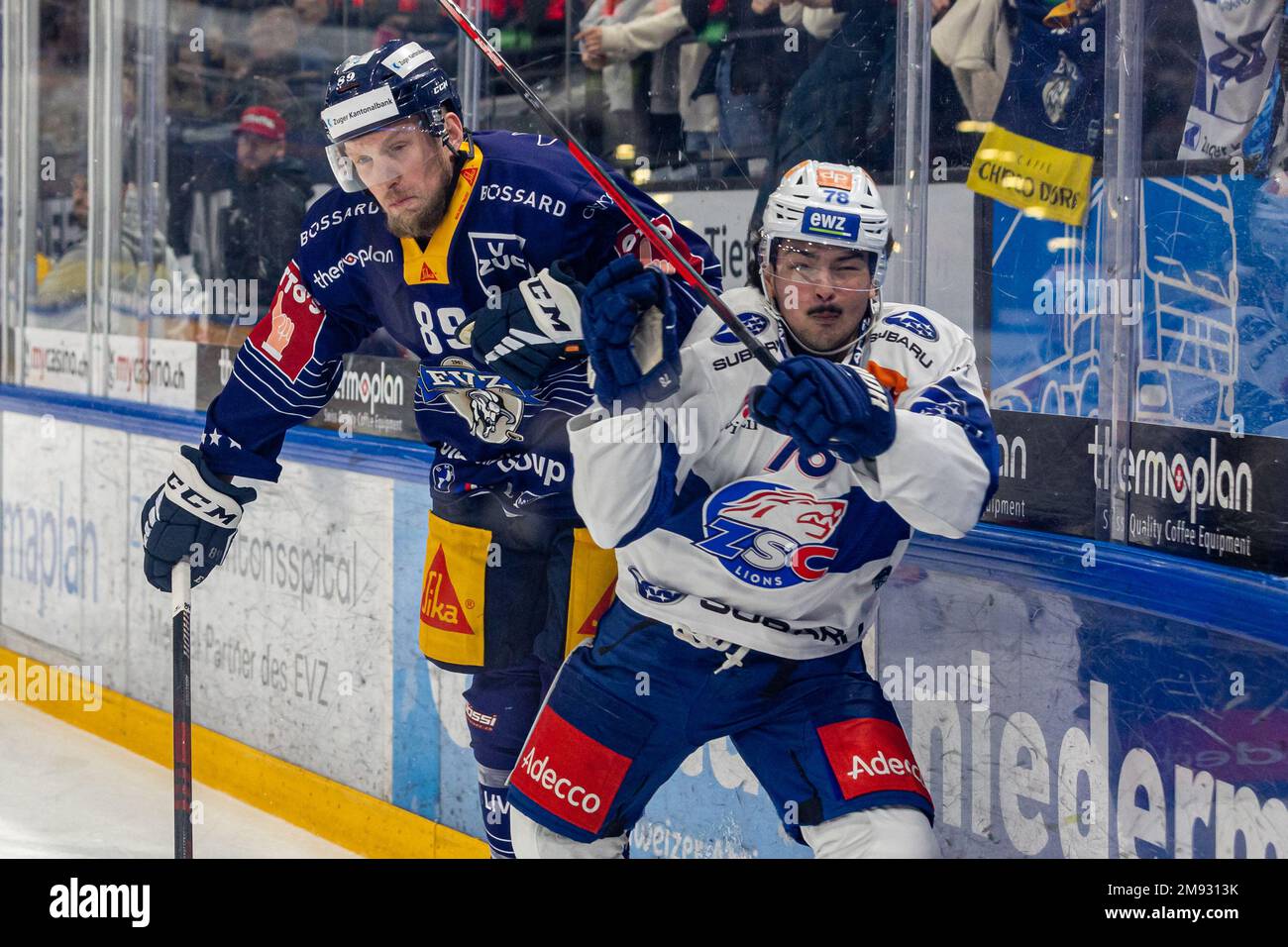 Justin Abdelkader #89 (EV Zug) checks against Kyen Sopa #78 (ZSC Lions ...