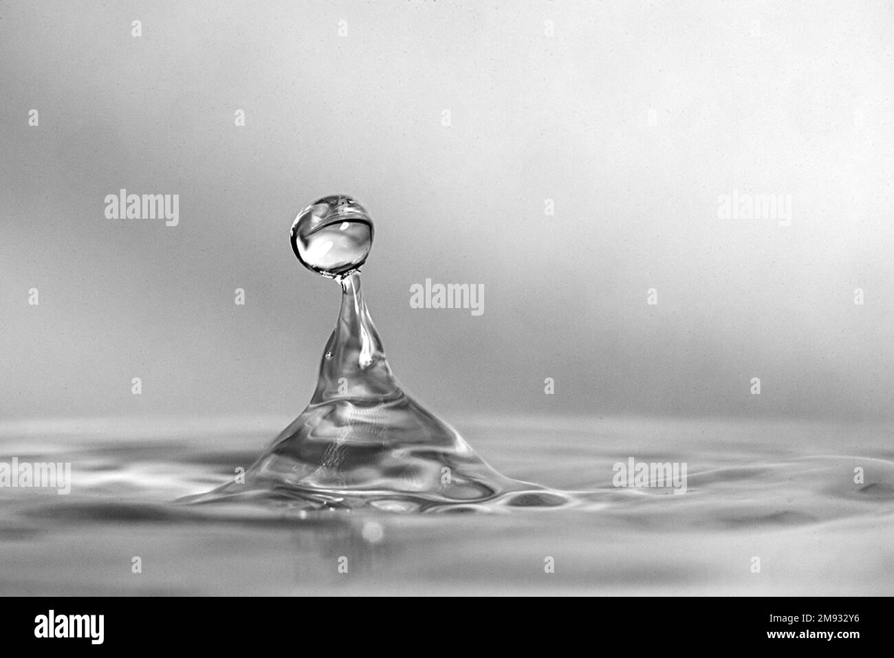A beautiful grayscale background of water drop splash Stock Photo - Alamy