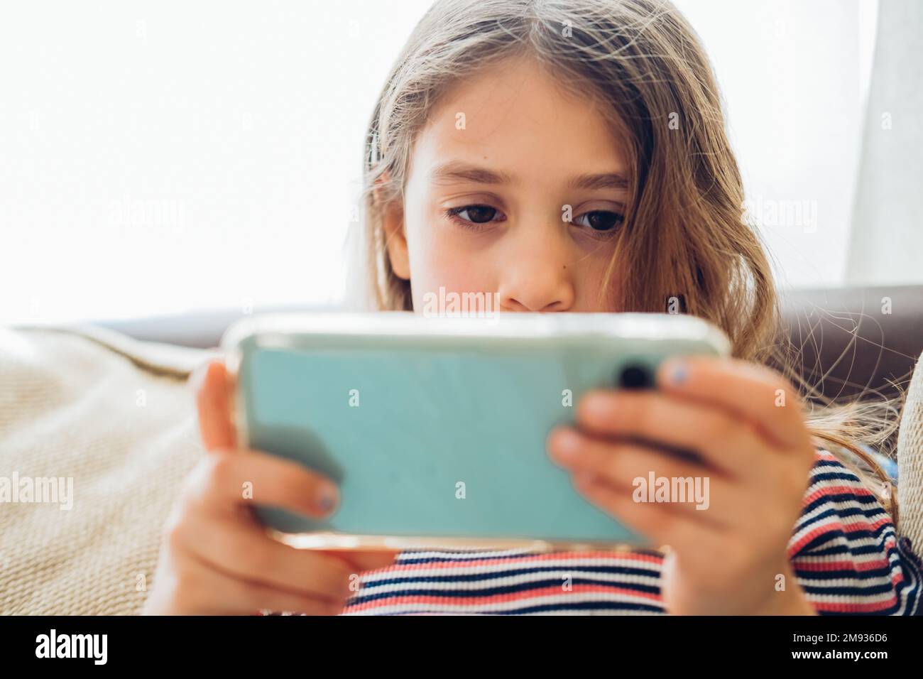 Little girl using computer hi-res stock photography and images - Alamy