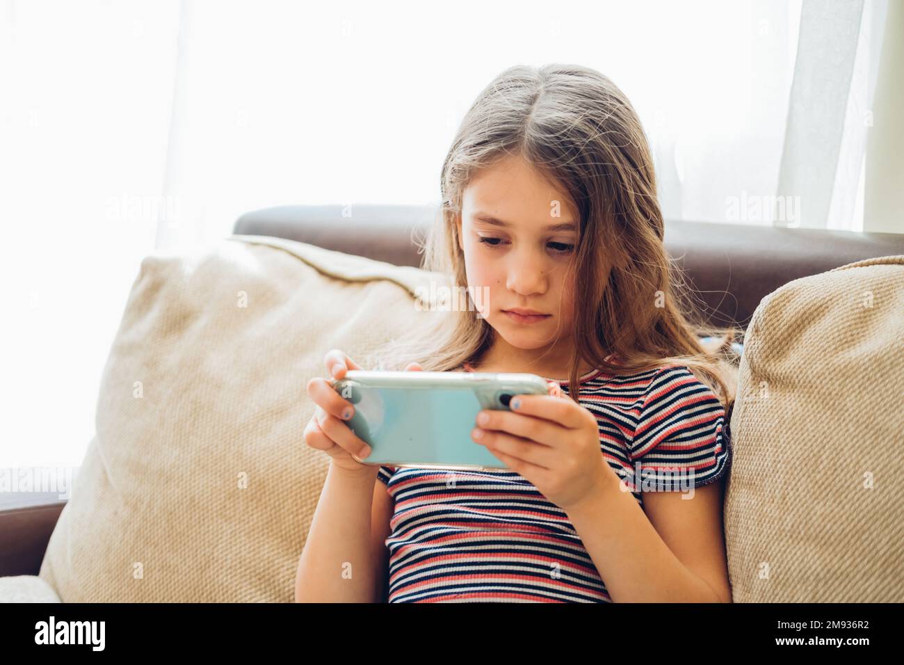 Little girl using computer hi-res stock photography and images - Alamy