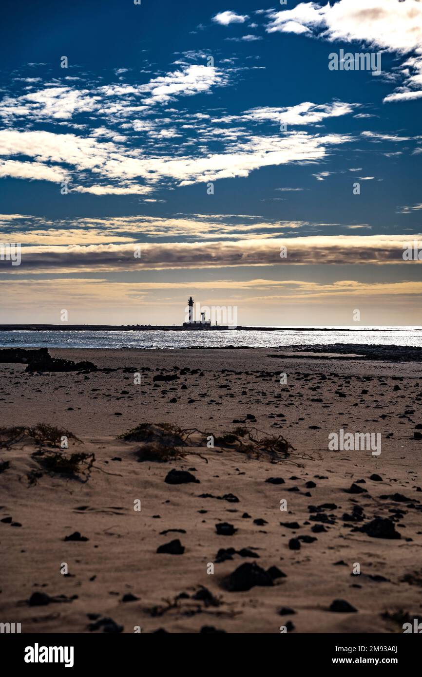 A view of El Toston Lighthouse on the Canary island of Fuerteventura ...