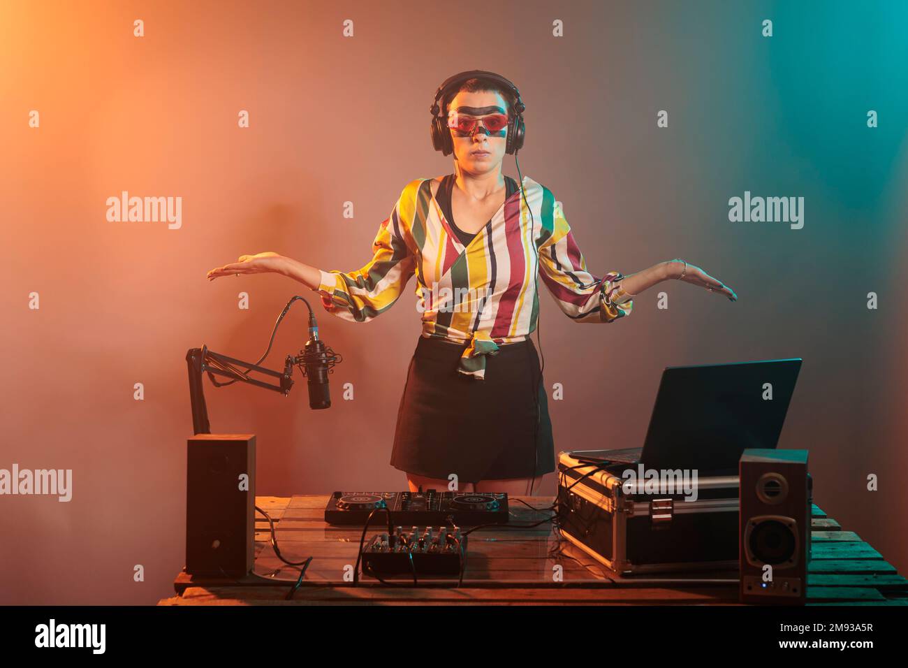 Clueless doubtful DJ showing unsure gesture, doing i dont know sign in ...