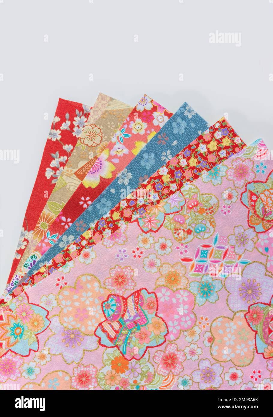 Photograph of a stack of spread-out traditional Japanese furoshiki ...