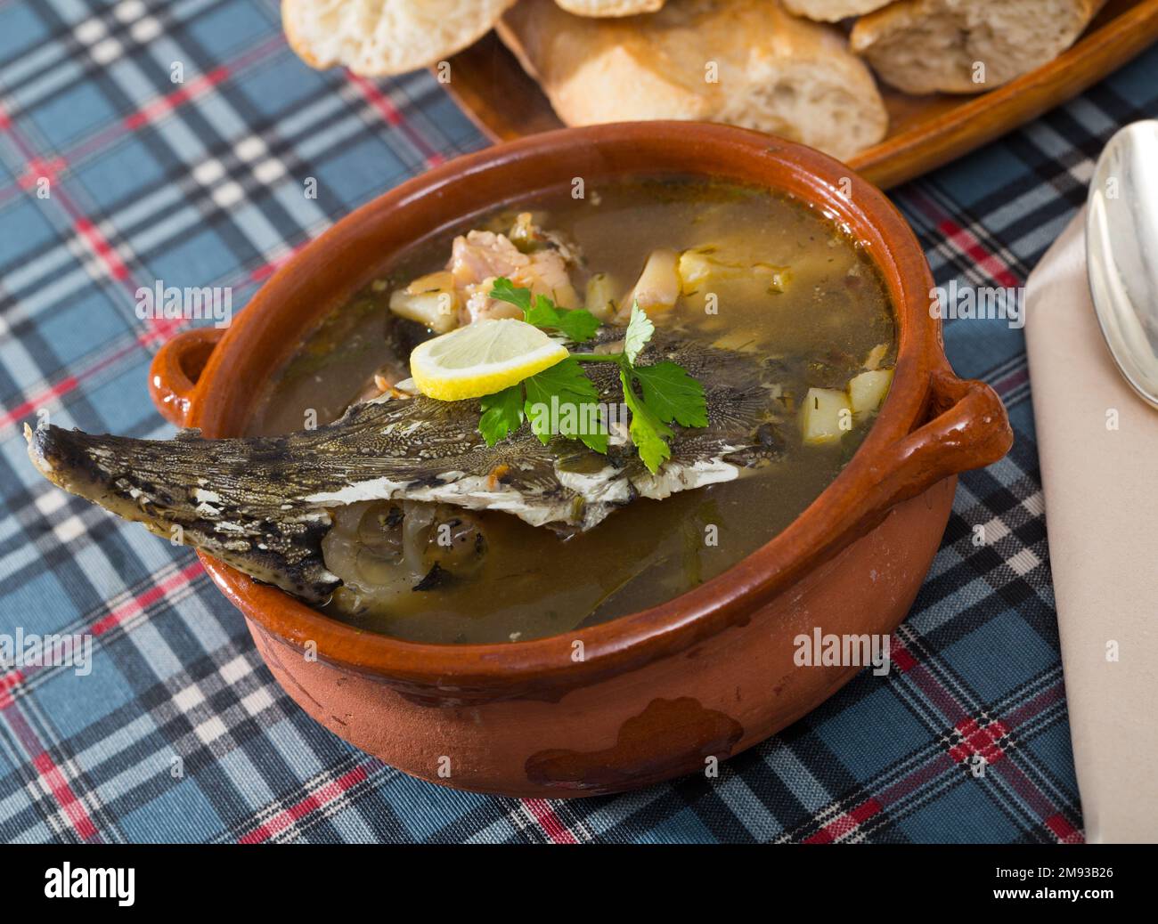 Fish soup with sturgeon in pottery Stock Photo - Alamy
