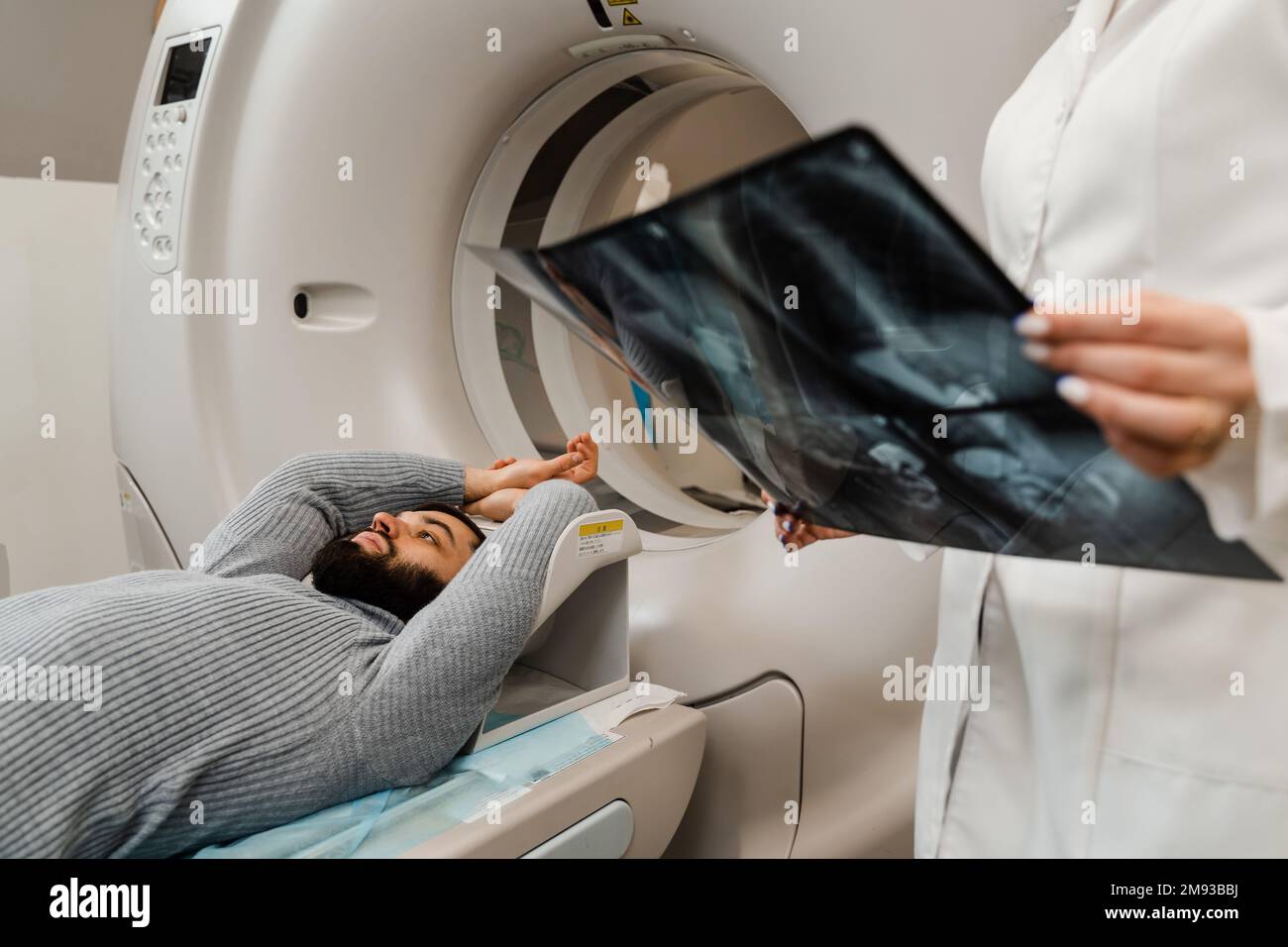 Man is doing computed tomography x-ray scan chest examination of ...