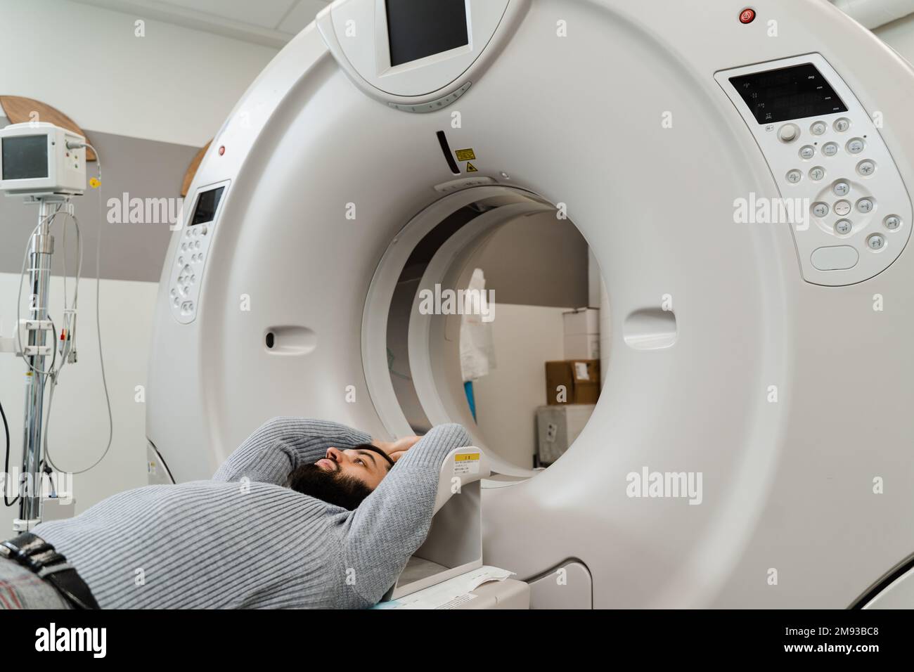 CT scan of abdominal of man in medical clinic. Man is doing computed ...