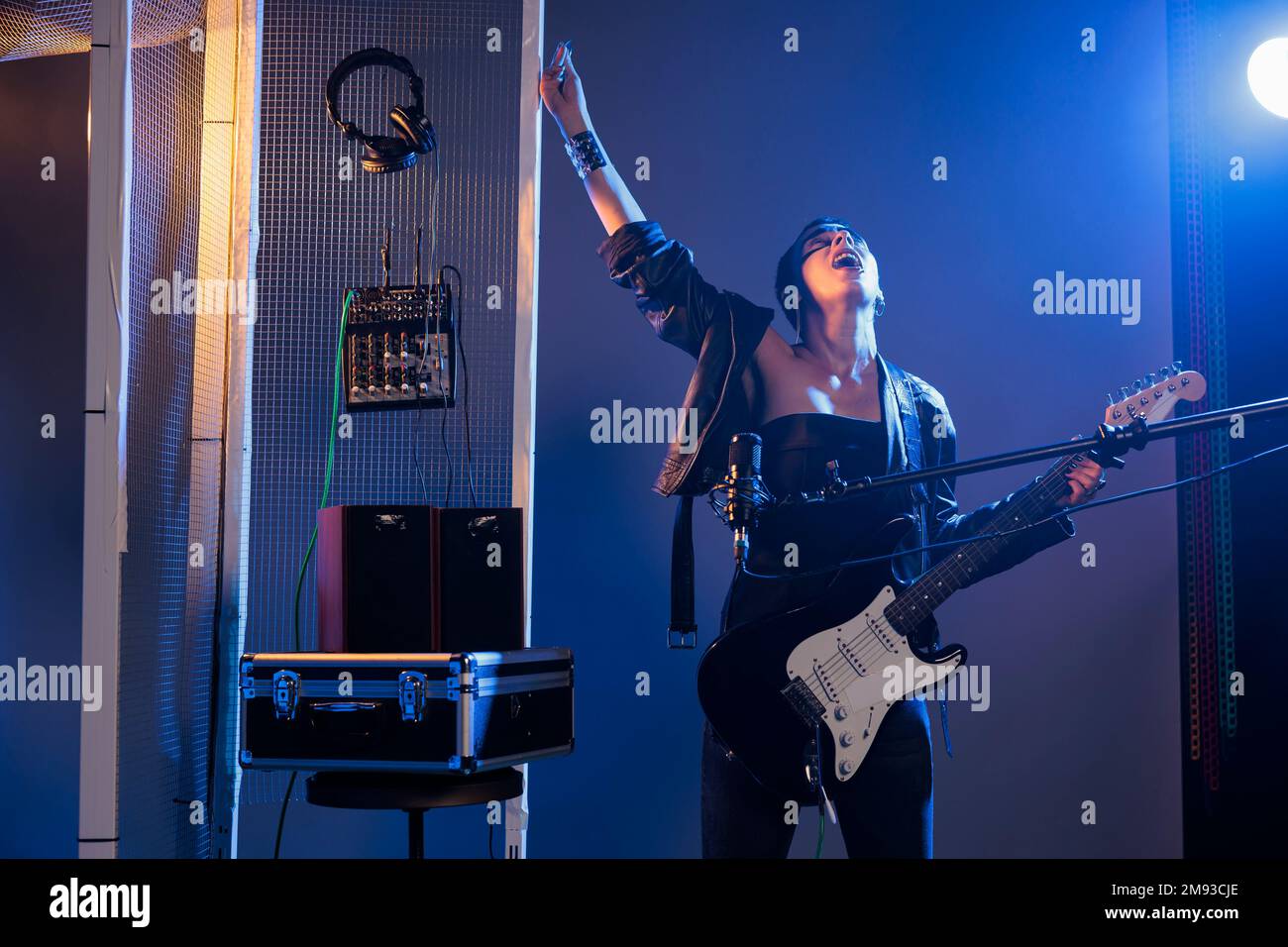 Punk rocker doing live performance in studio, creating funky cool vibe ...
