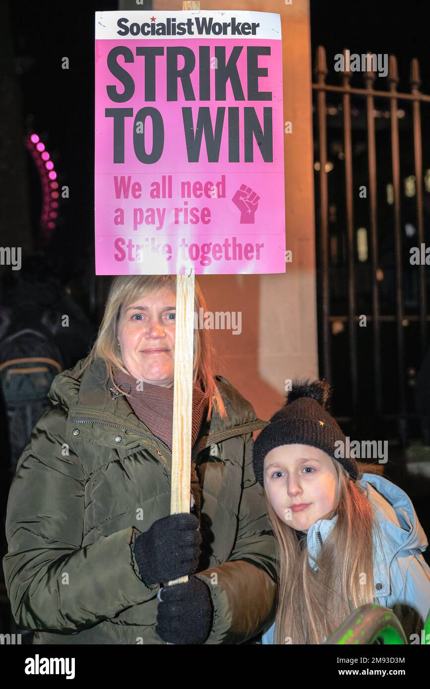London, UK. 16th Jan, 2023. A mother and daughter at the rally ...