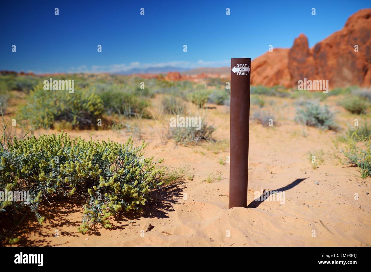 STAY ON TRAIL sign in sandstone formations of Valley of Fire State Park ...