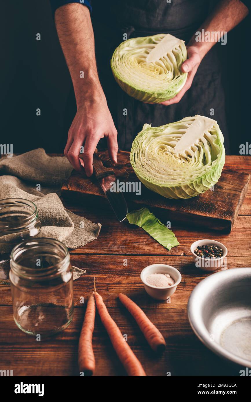 Hands man cutting cabbage hi-res stock photography and images - Alamy