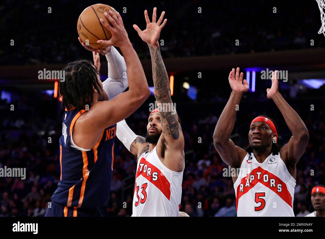 Toronto Raptors guard Gary Trent Jr. (33) and Precious Achiuwa (5 ...