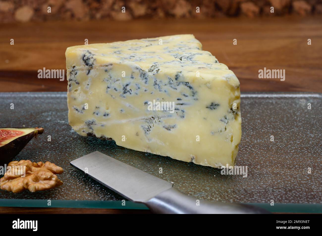 Cheese collection, piece of English old stilton blue cheese close up ...