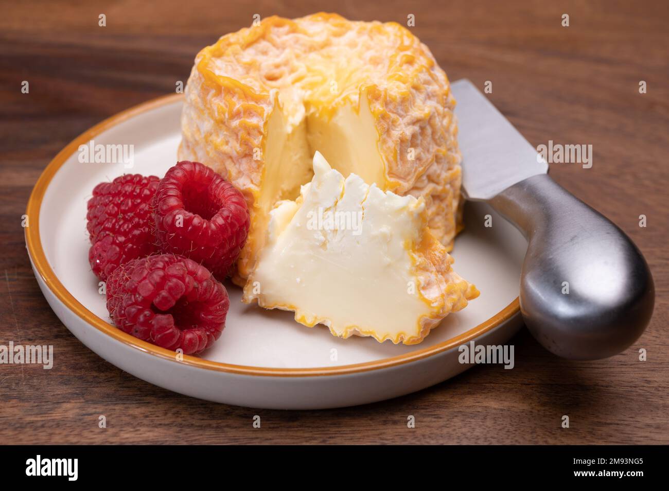 French Langres soft cows crumbly cheese with washed rind structure made ...