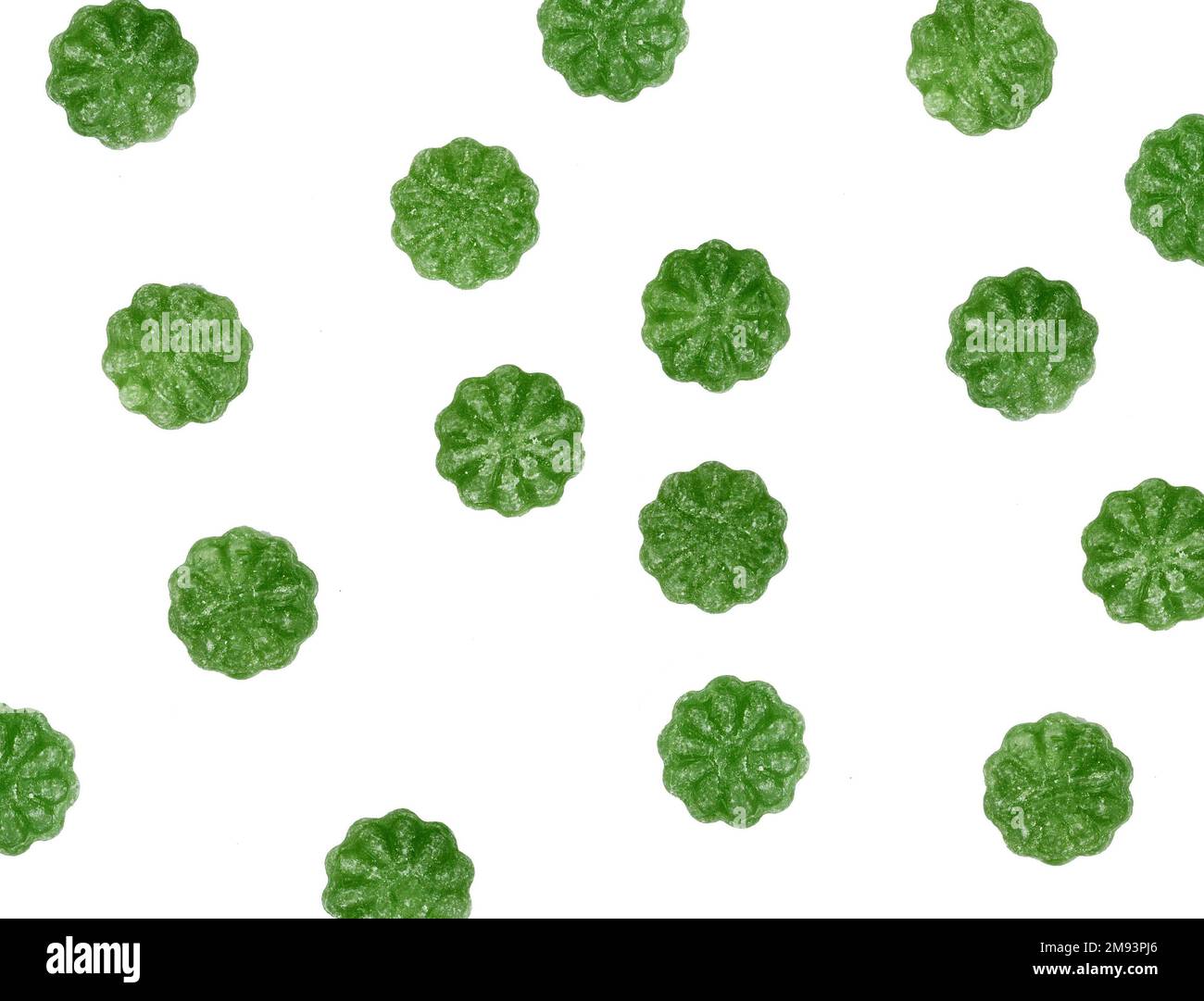 Green mint candies isolated on white background Stock Photo - Alamy
