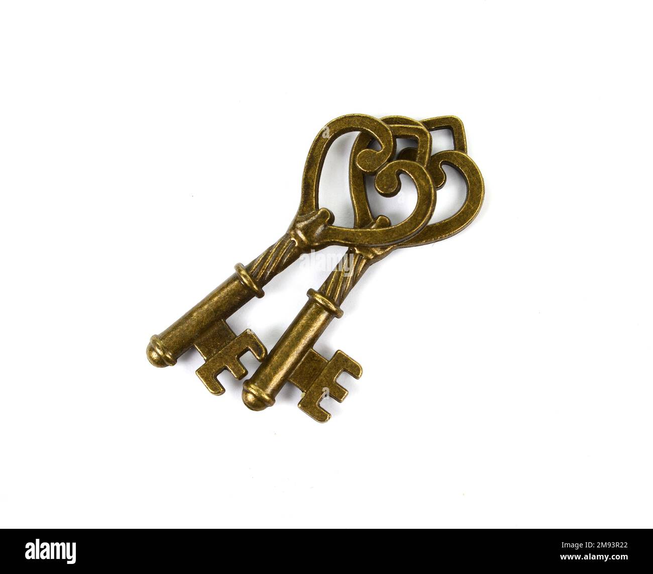 two vintage keys isolated on white. Two heart-shaped keys Stock Photo ...
