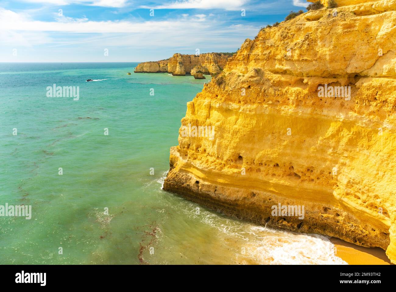 Natural caves and beach, Algarve Portugal. Rock cliff arches of Seven ...