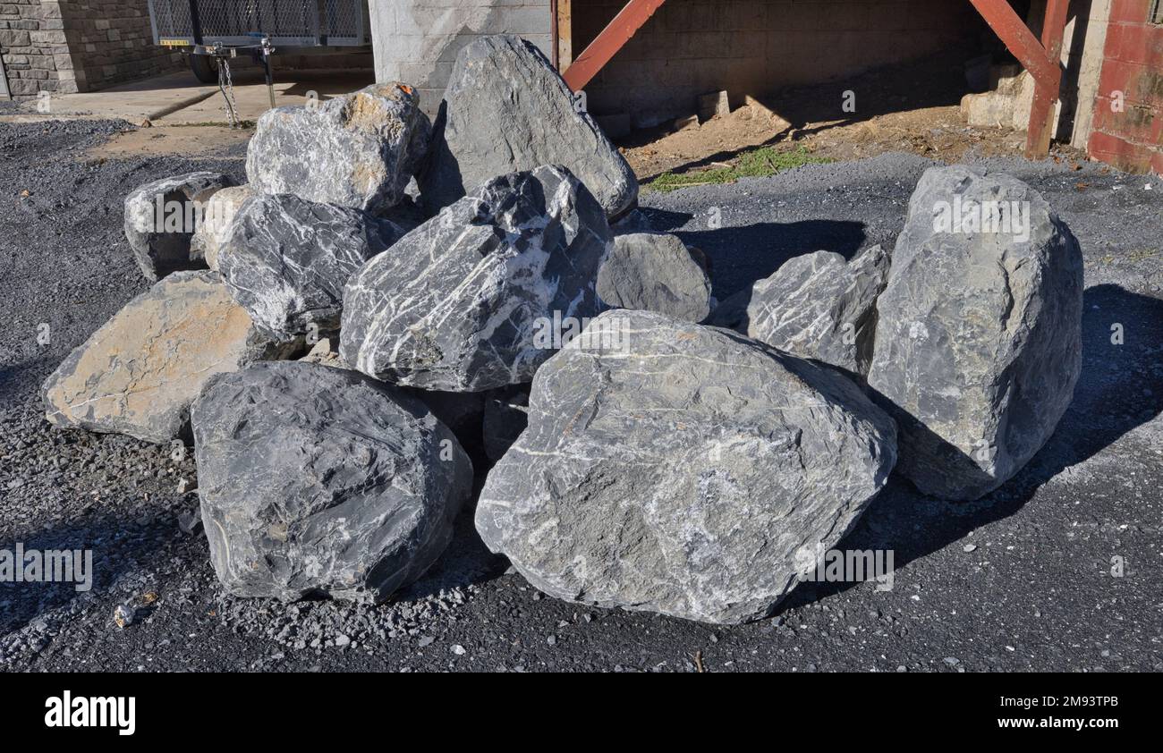 Giant rocks at construction site Stock Photo - Alamy