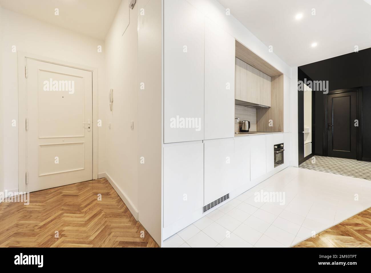 Entrance hall of a loft-style vacation rental home with a kitchen open ...