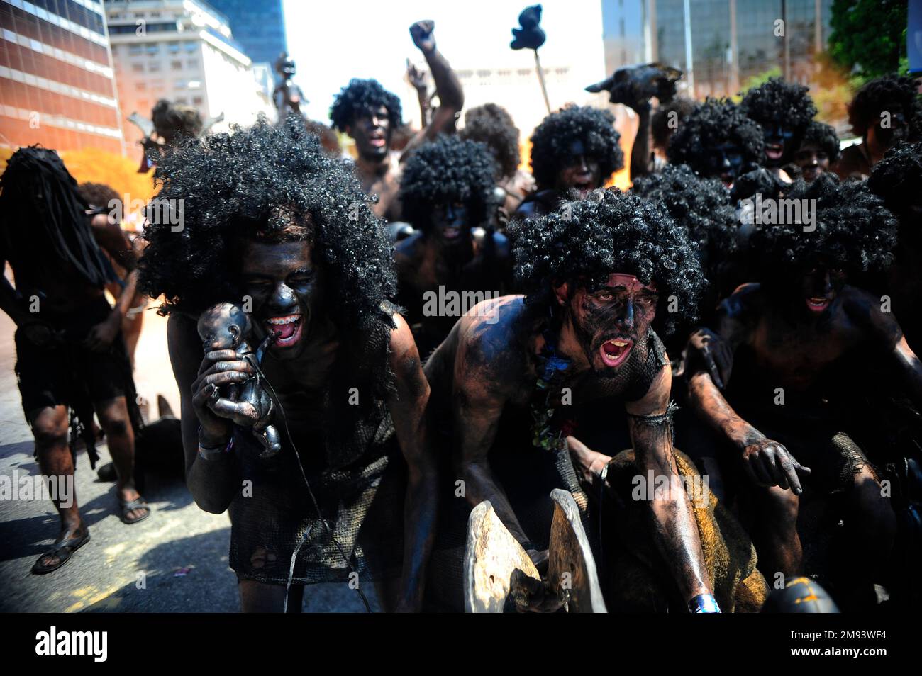 People gather wearing costumes for brazilian carnival celebration ...