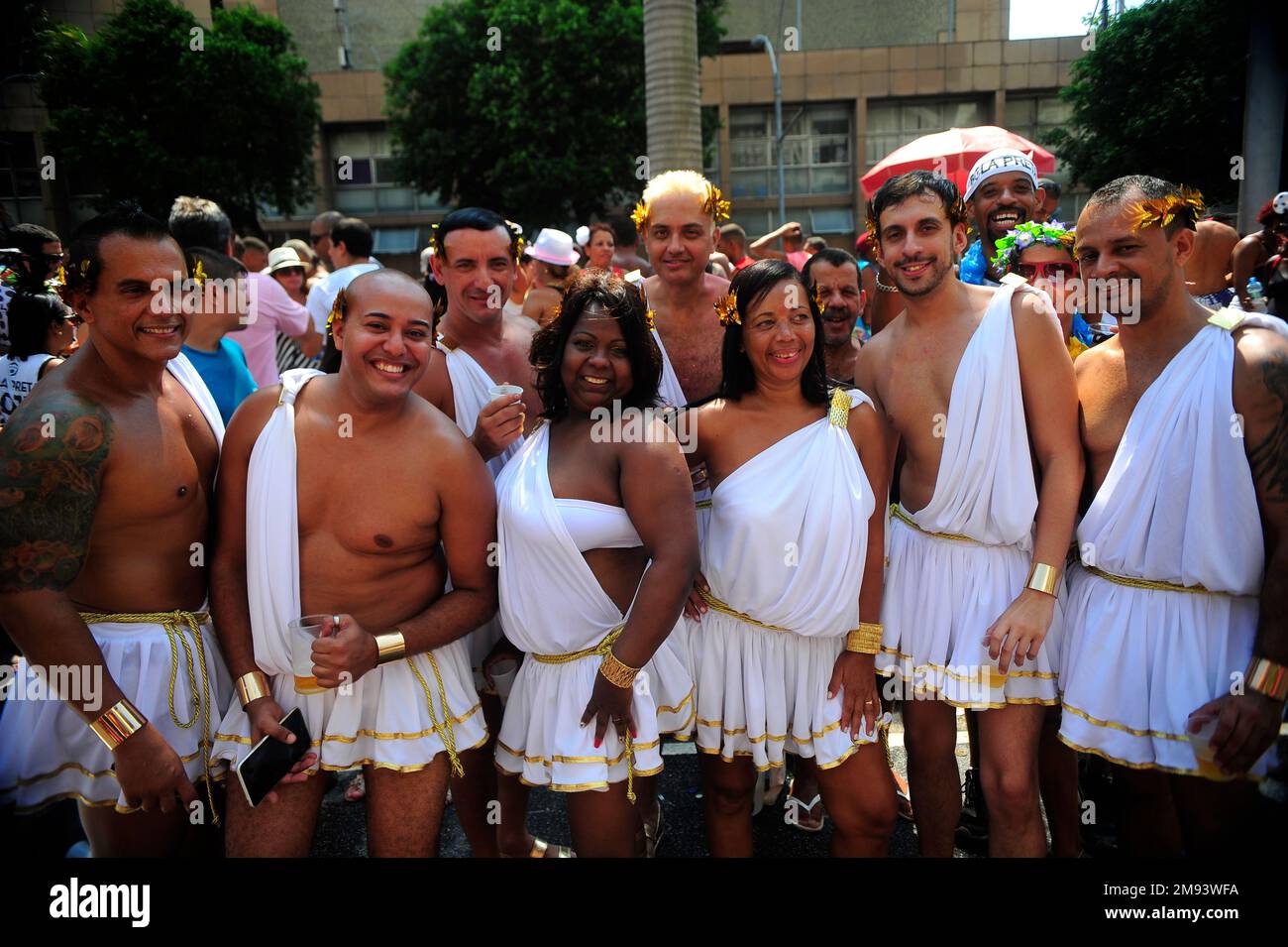 People gather wearing costumes for brazilian carnival celebration ...