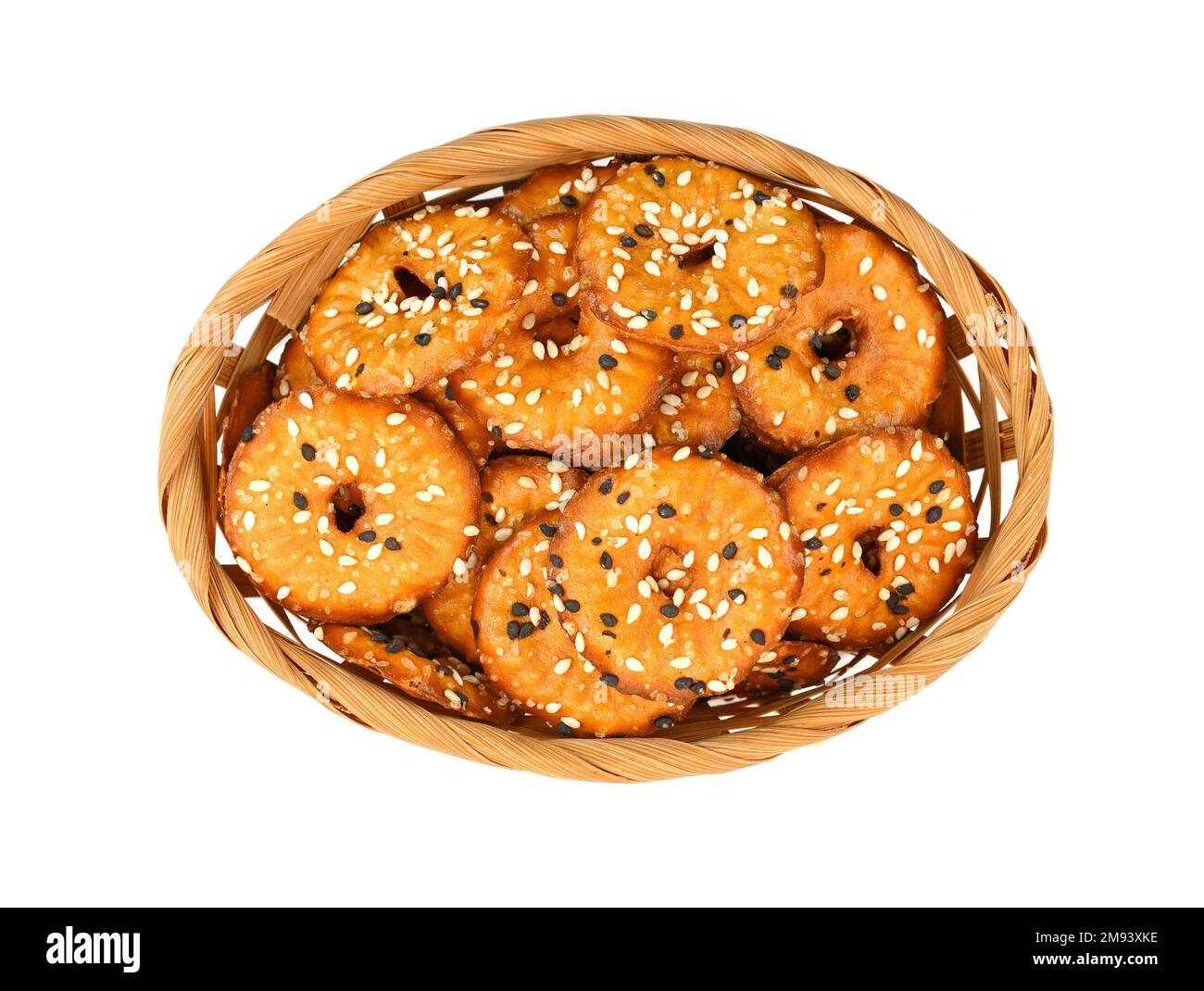 Salted round pretzels with black and white sesame isolated on white ...