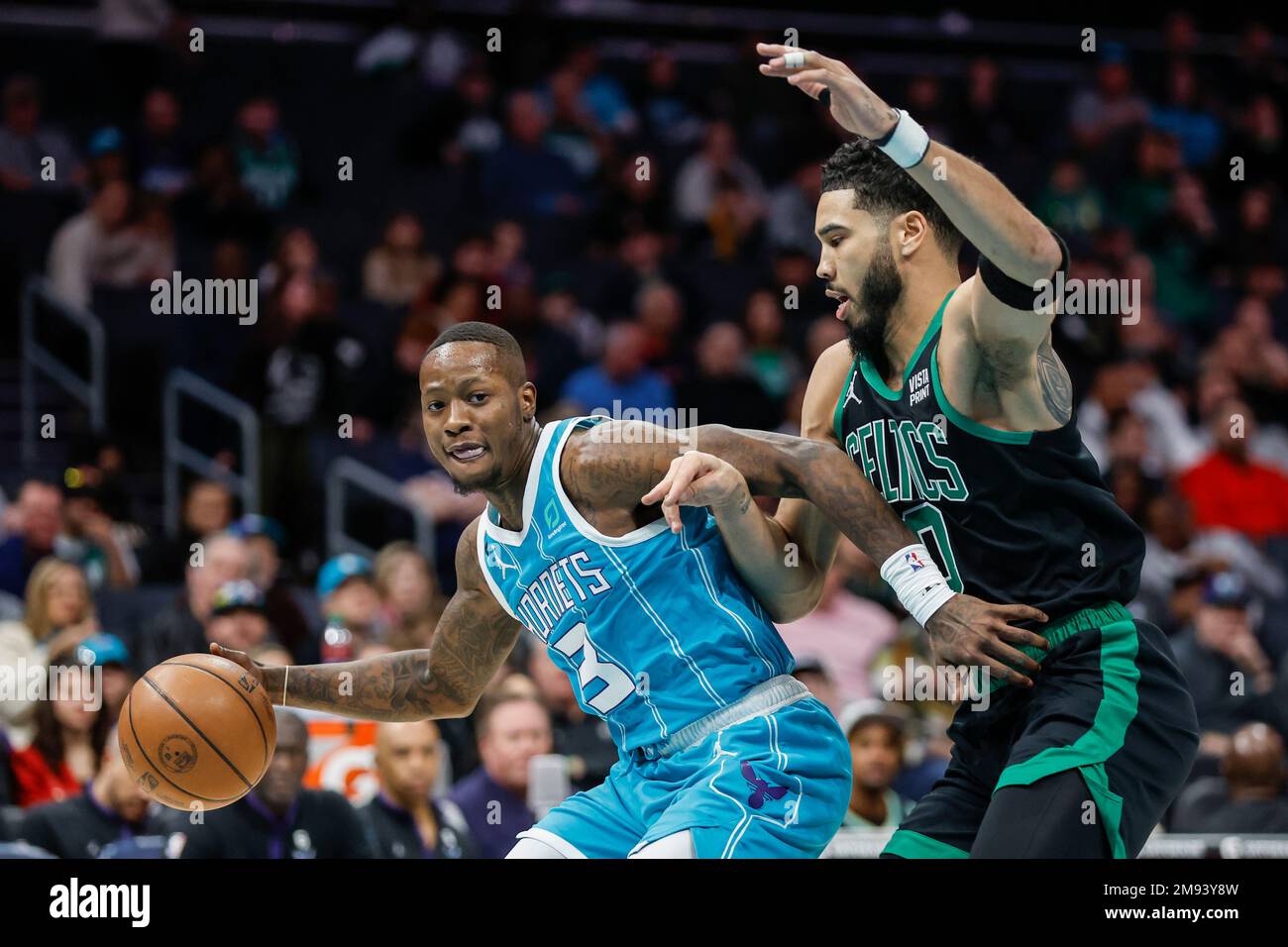 Charlotte Hornets guard Terry Rozier (3) looks to drive against Boston Celtics forward Jayson ...