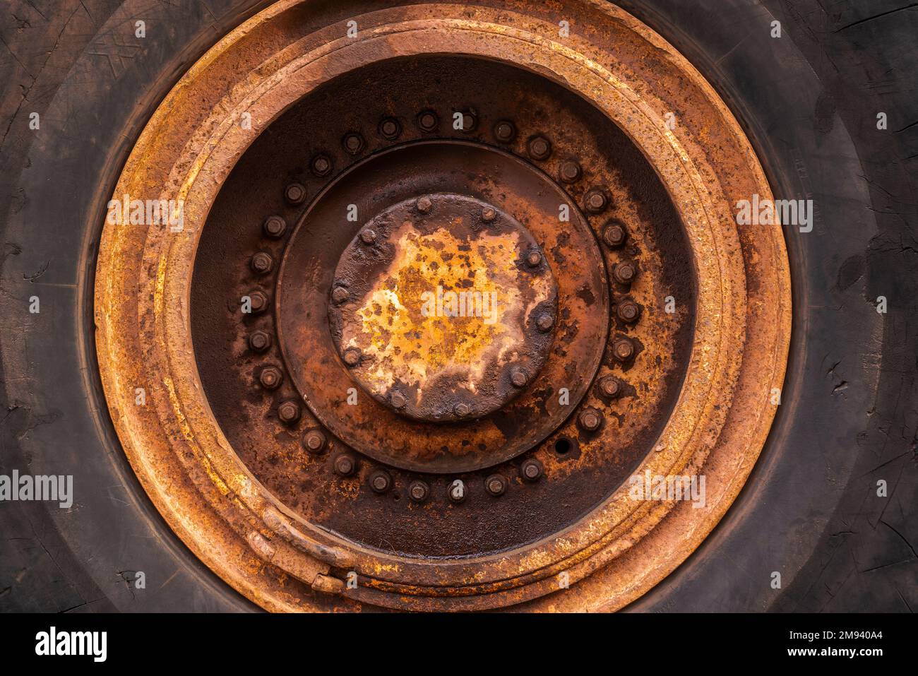 Full frame circular background texture of the rusted rim and giant ...