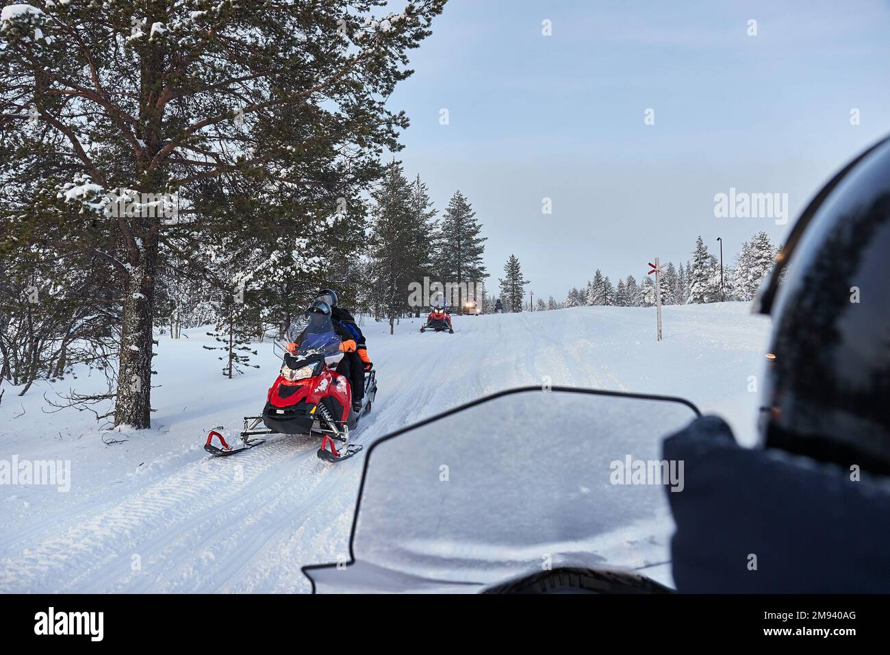 Snow mobile trip in Lapland as a passenger Stock Photo - Alamy