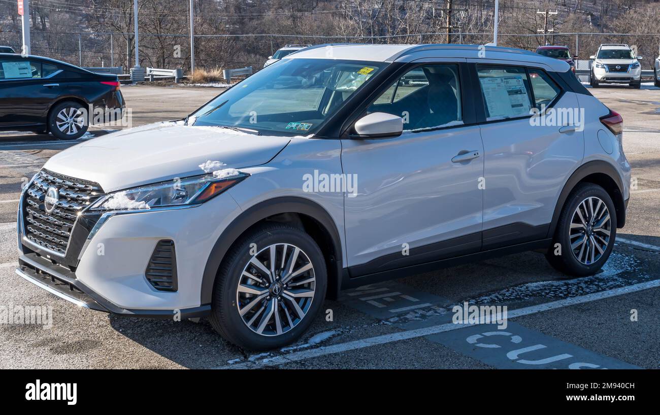 A new, white Nissan SUV for sale at a dealership in Wilkins Township ...