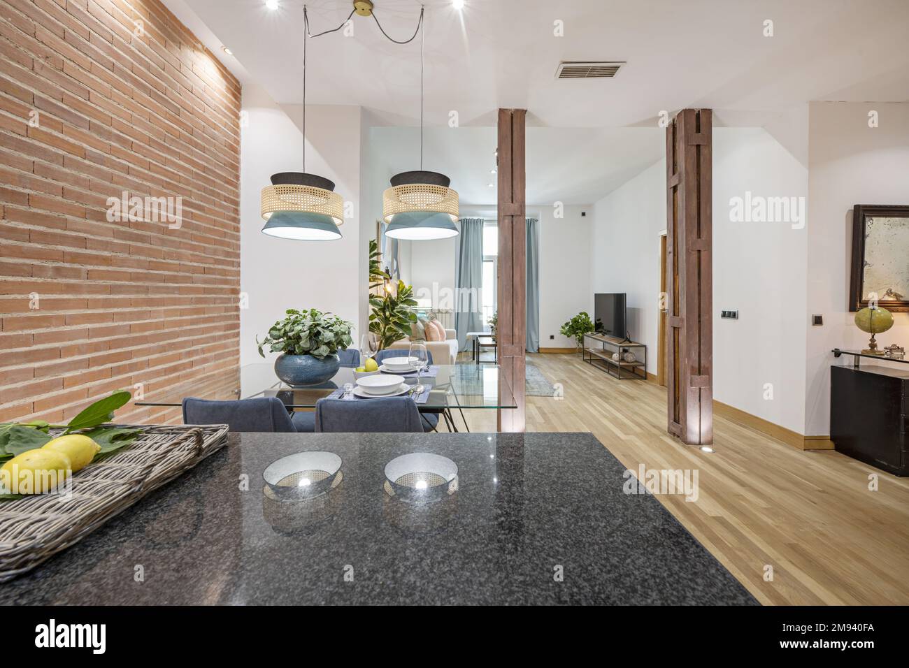 Studio apartment with open kitchen with polished black granite ...