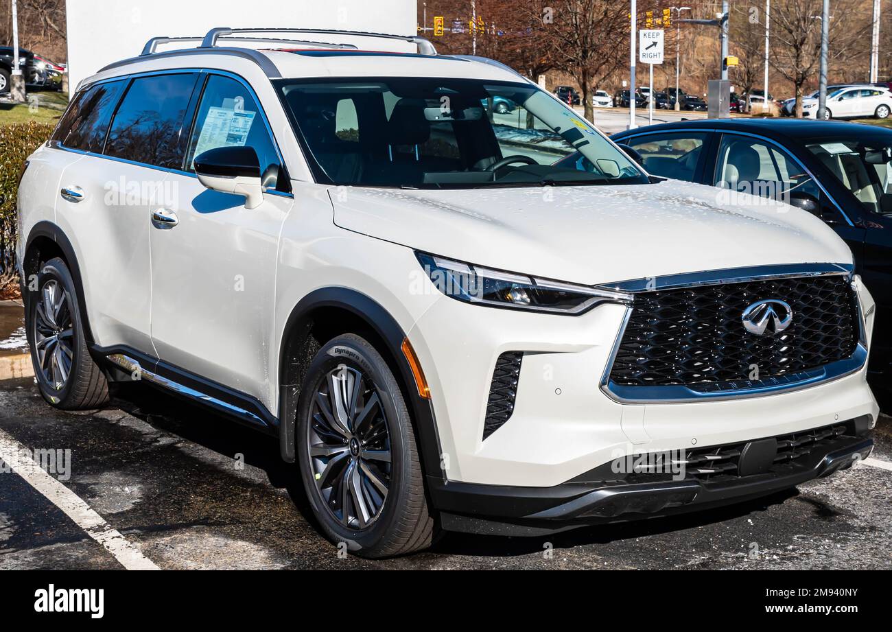 A 2023, white Infiniti QX80 SUV for sale at a dealership in Monroeville ...