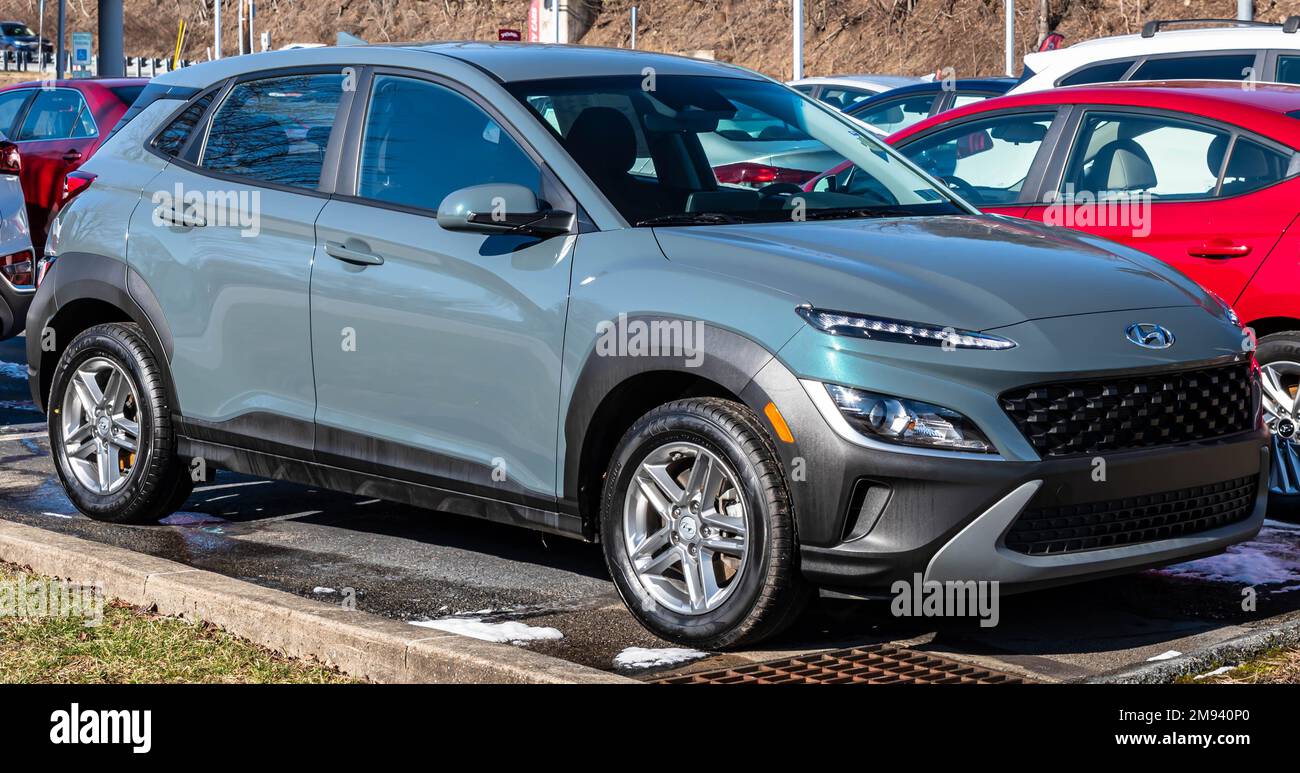 A new, four door, light green Hyundai hatchback for sale at a ...