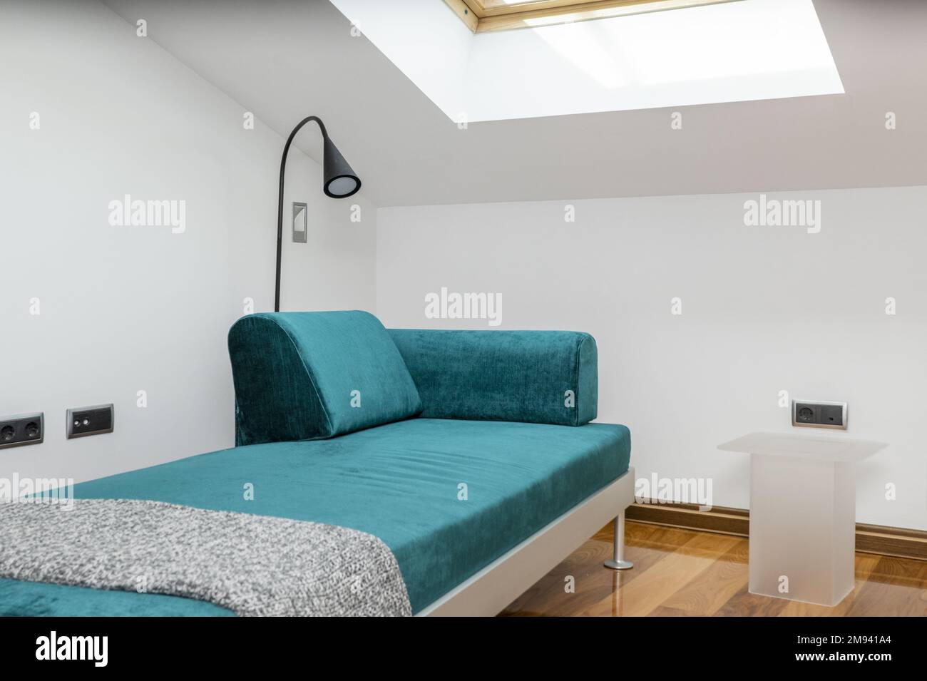 Living room of a loft-style holiday apartment with skylights in the ...