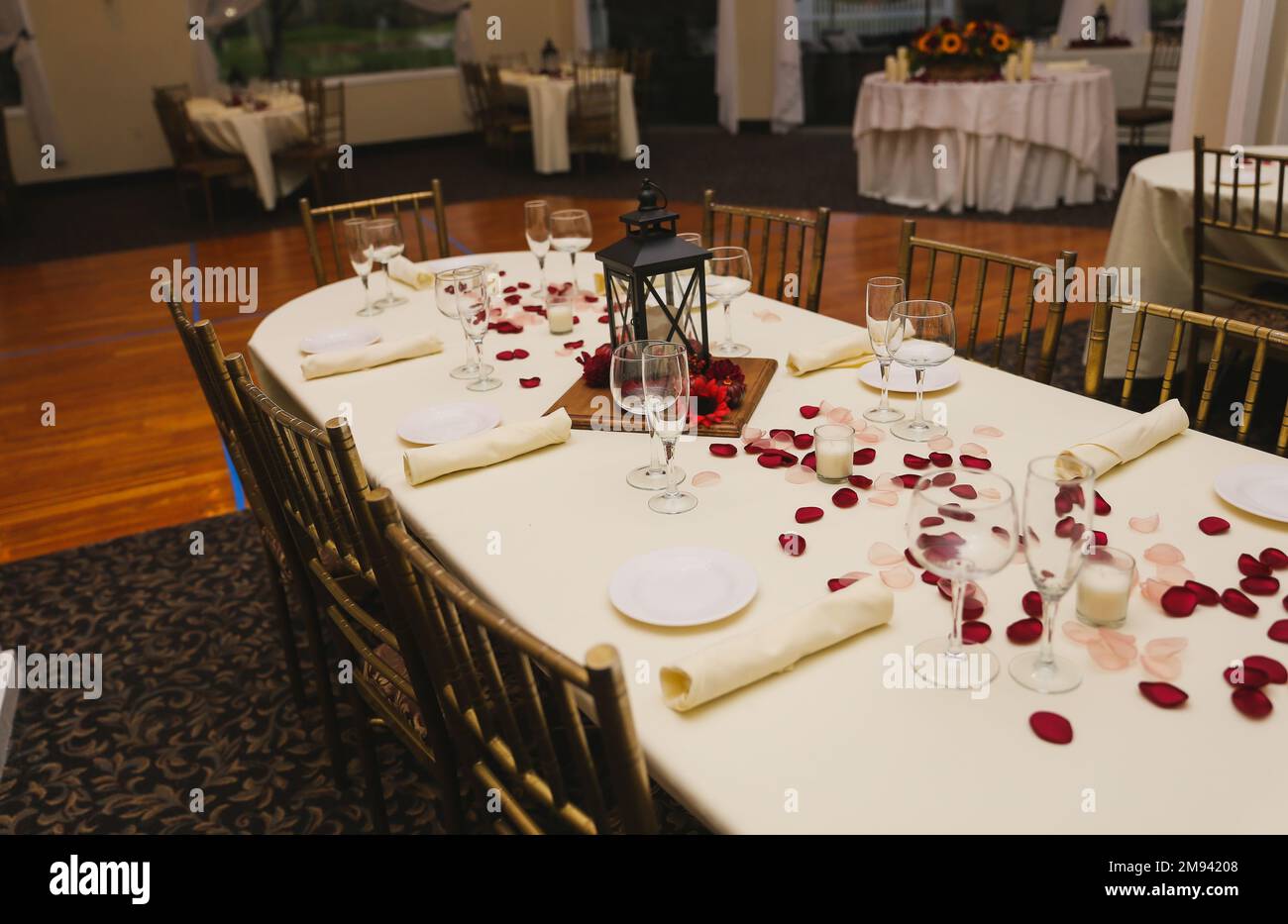 wedding venue tables flowers alcohol reception celebration candles ...