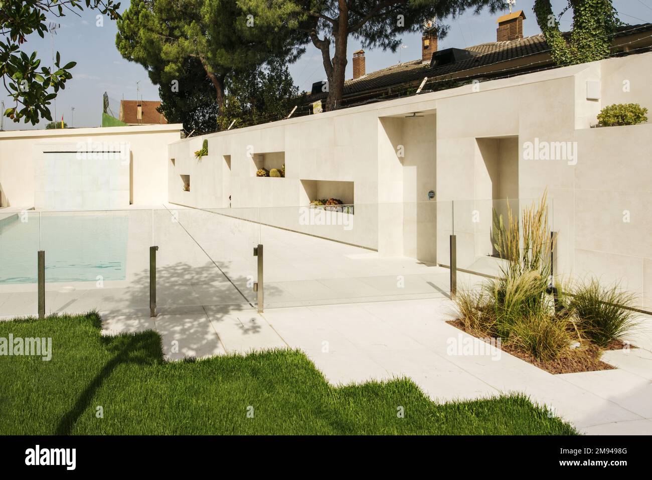 Beautiful swimming pool of a luxury detached house with marble tiles ...