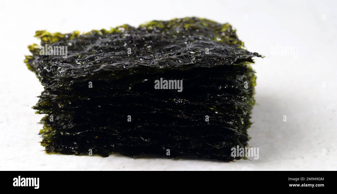 A close-up image of laver against a white background. Concept about ...