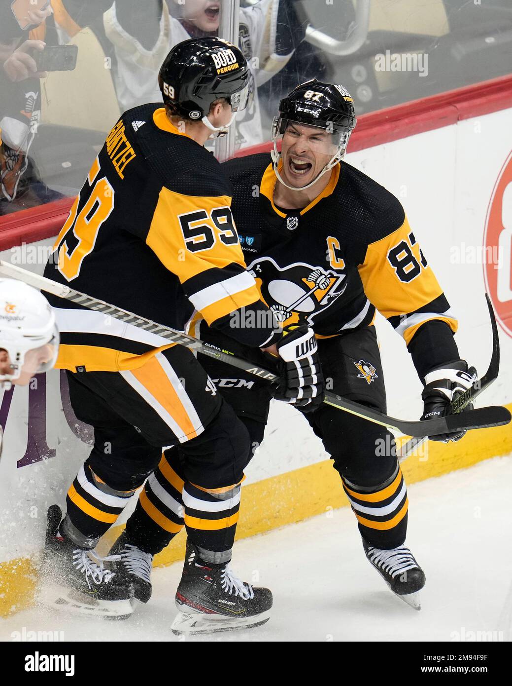 Pittsburgh Penguins' Jake Guentzel (59) celebrates his winning goal ...