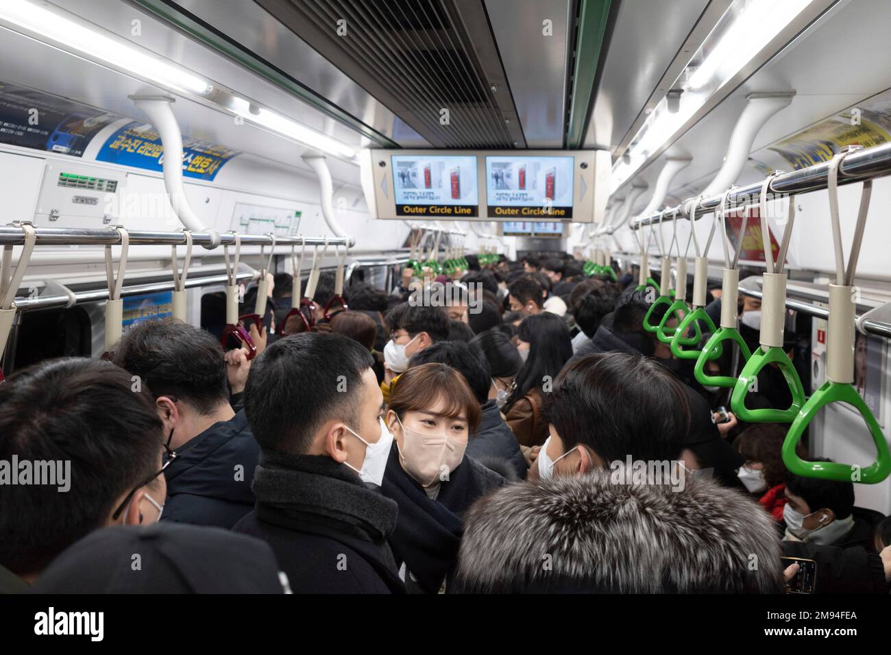 Seoul, Korea. 20th Dec, 2022. Commuters, passengers and tourists alike ...