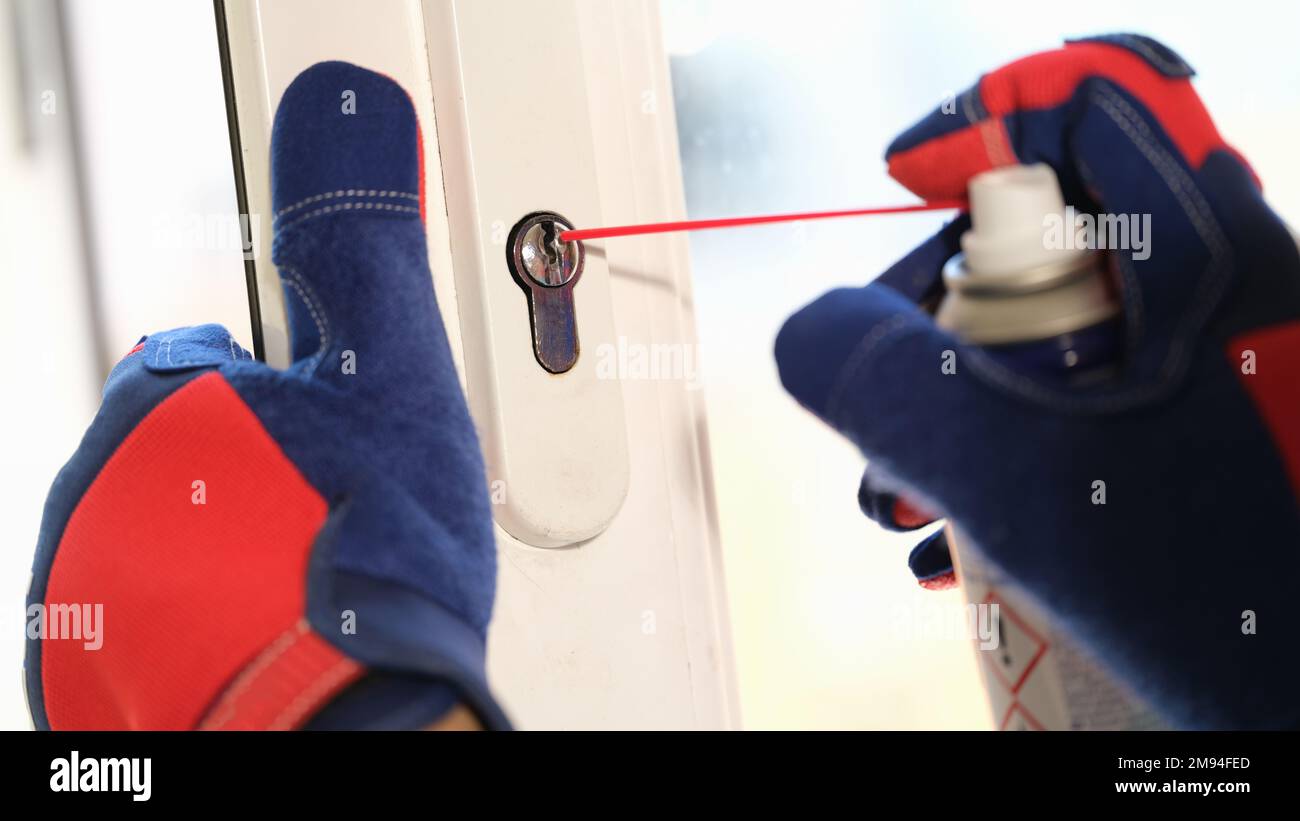 Craftsman solving problem in client house close up Stock Photo - Alamy