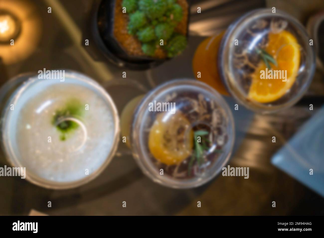 Glass of americano mixed with craft soda and yuzu orange juice blur ...