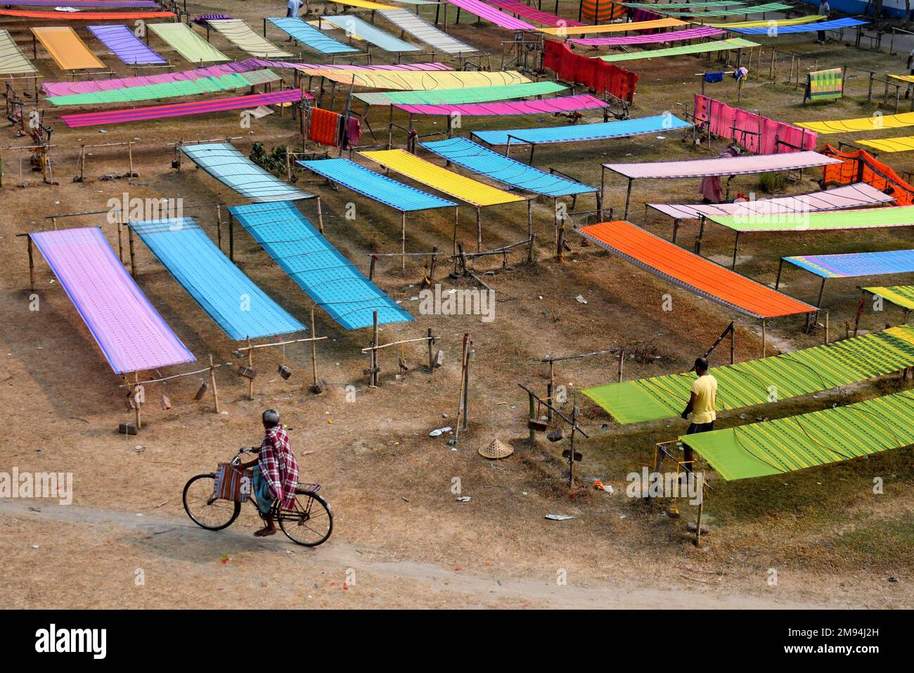 Shantipur, India. 14th Jan, 2023. A view of colourful Indian sarees ...