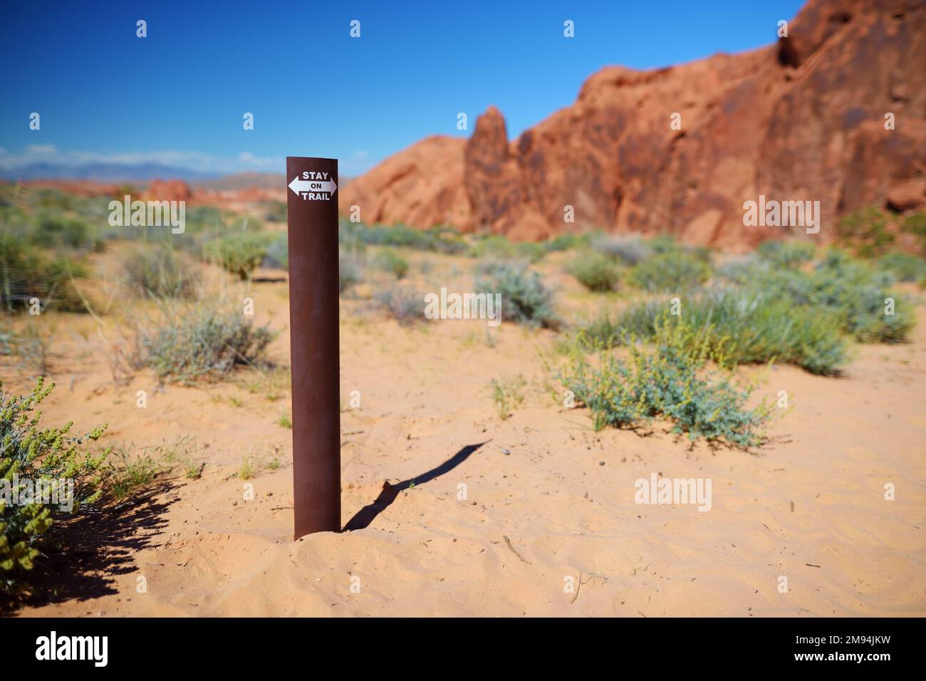 STAY ON TRAIL sign in sandstone formations of Valley of Fire State Park ...