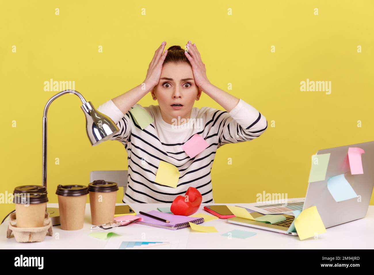Extremely shocked surprised woman office worker covered with sticky ...
